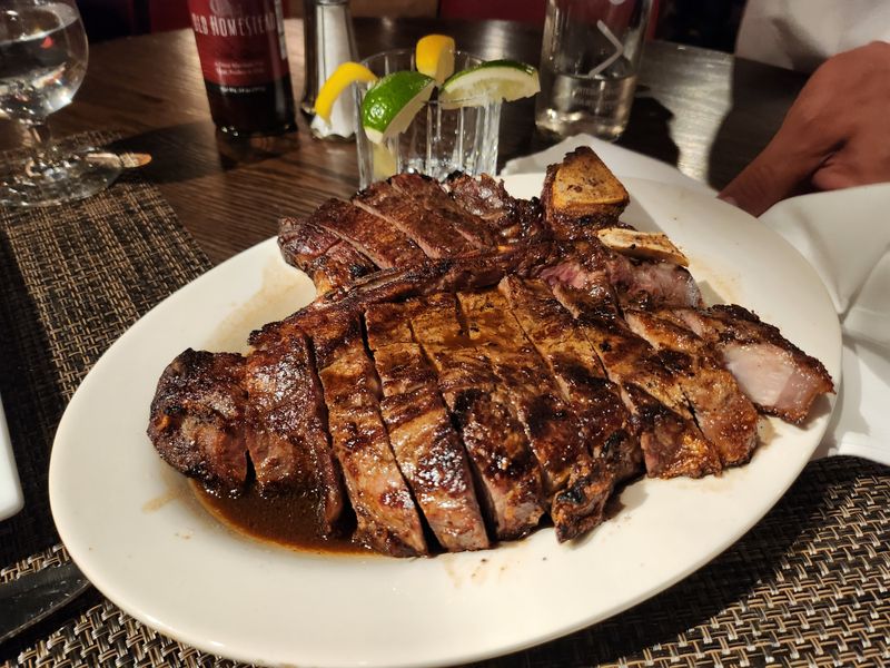 This no-frills New York restaurant is known for its standout NY strip steak